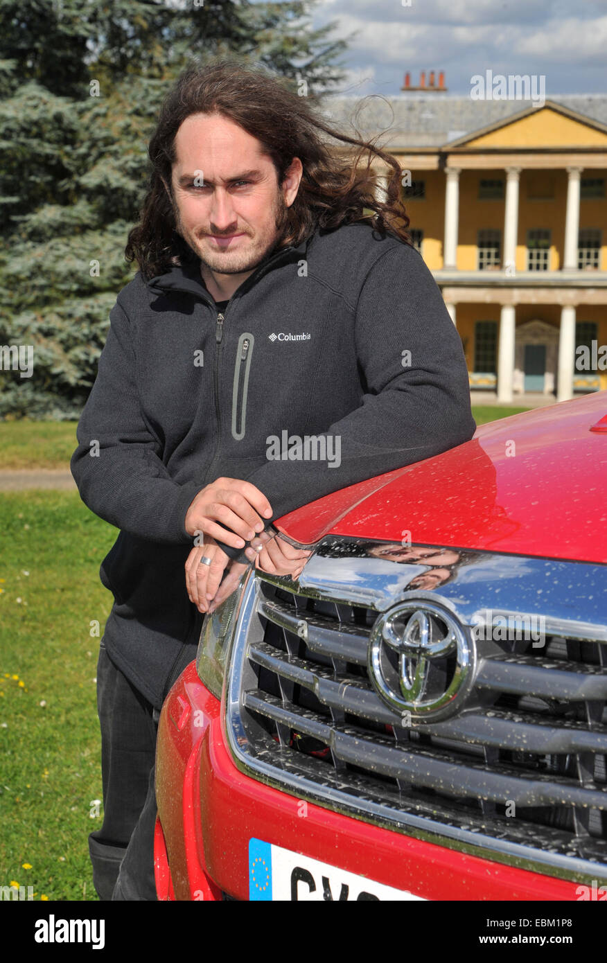 Comedian Ross Noble with a 2012 Toyota Hilux pick up truck driving off ...