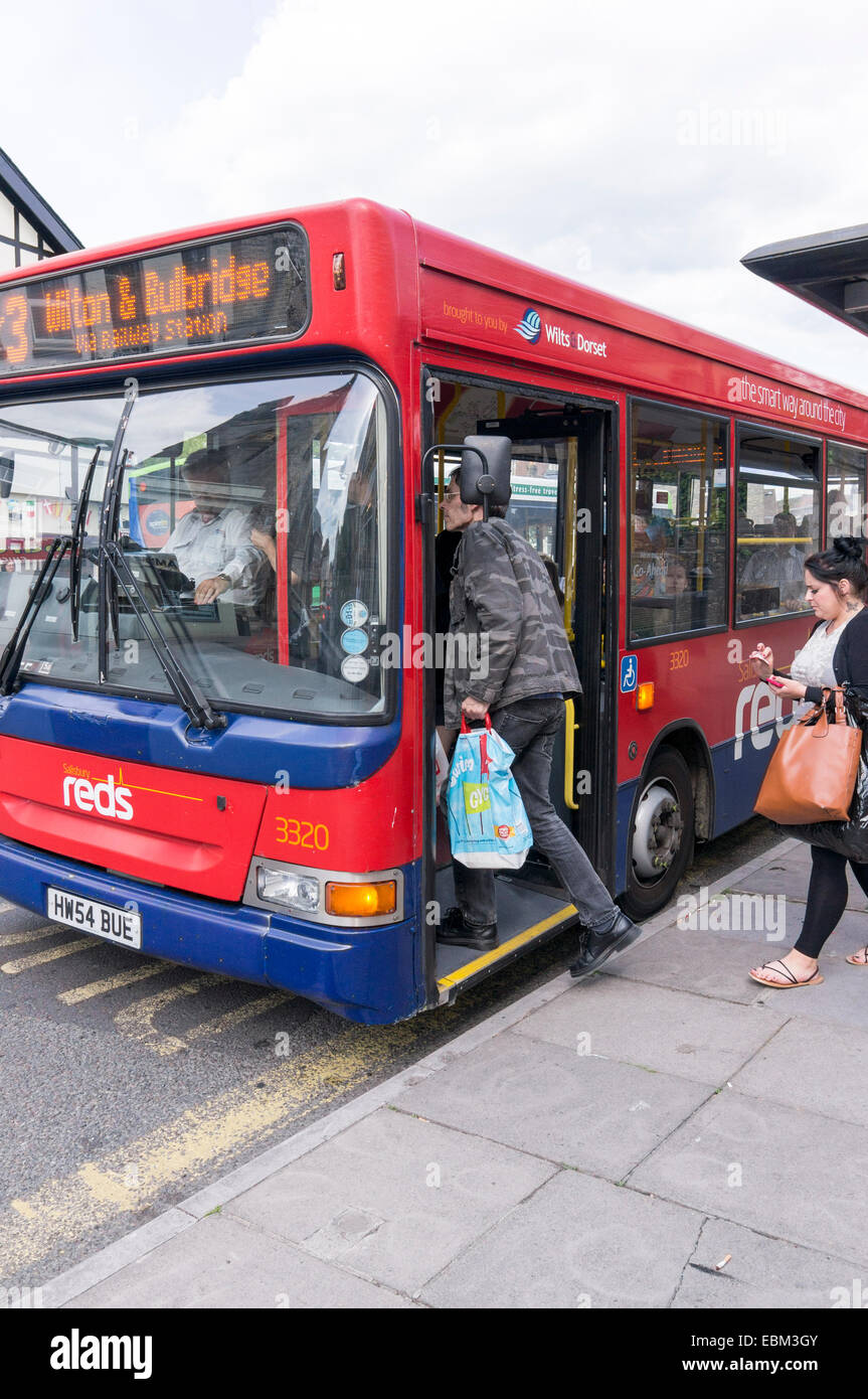People getting onto public transport bus UK Stock Photo - Alamy