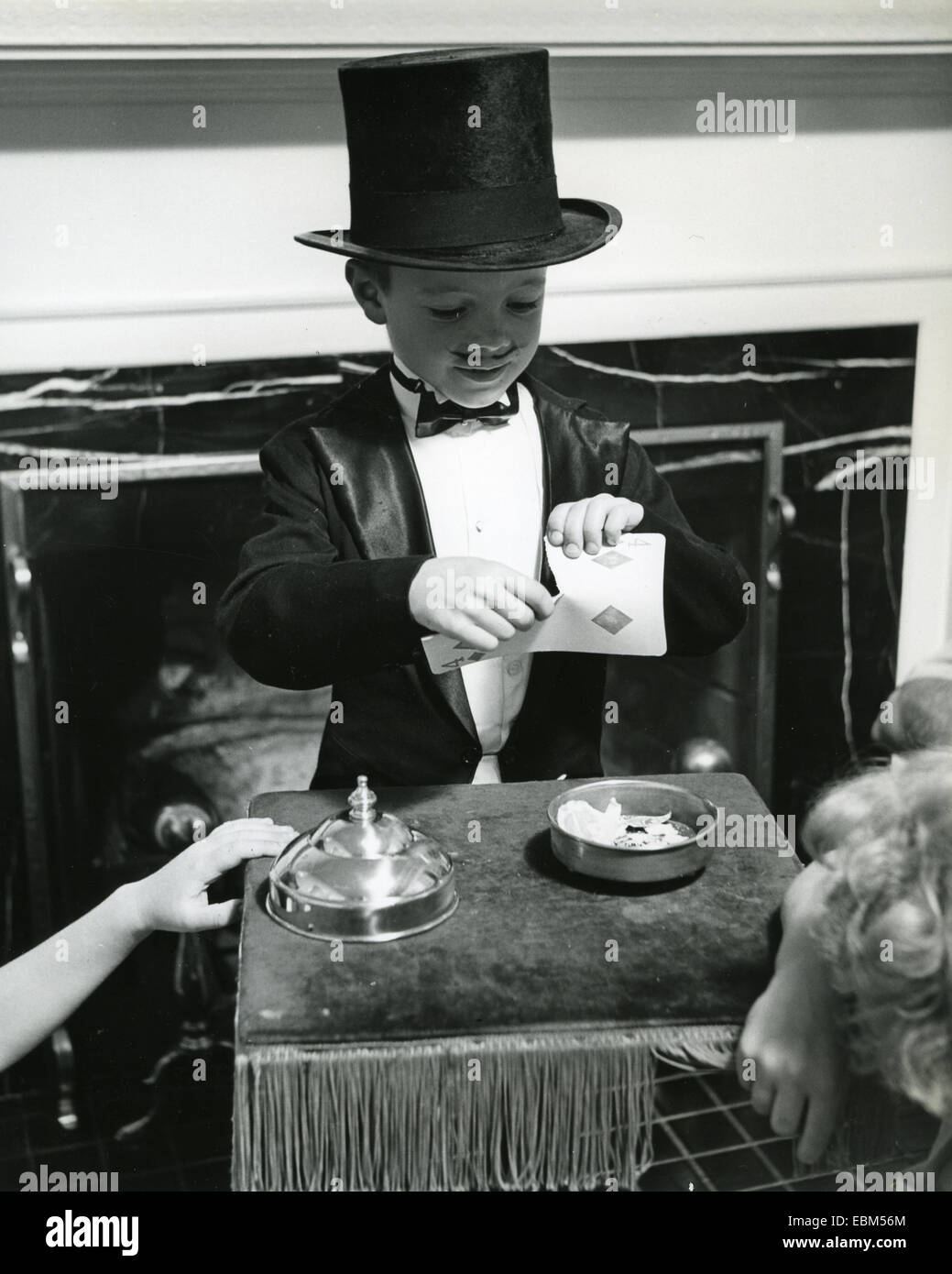 Boy magic trick hi-res stock photography and images - Alamy