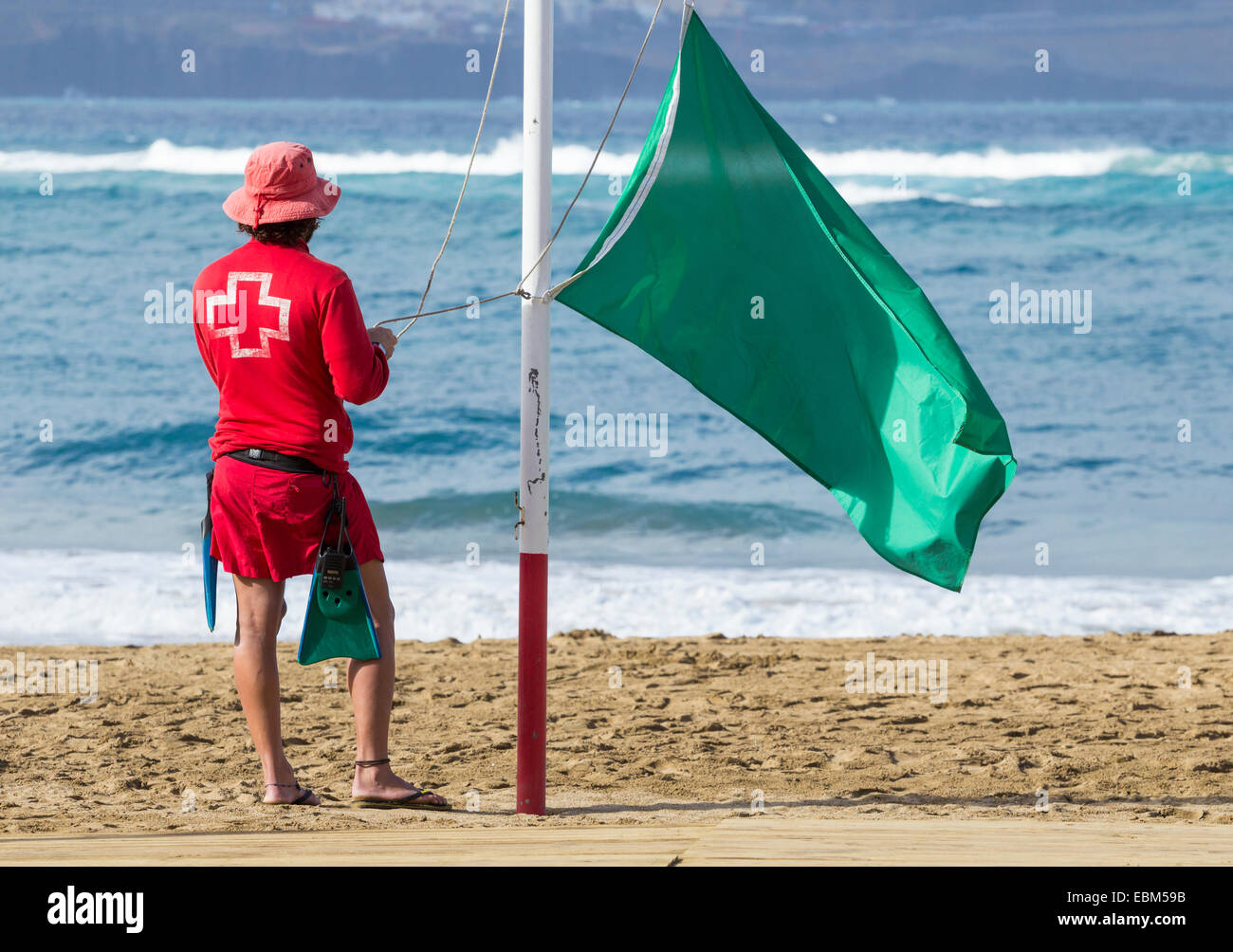 Raising flag hi-res stock photography and images - Alamy