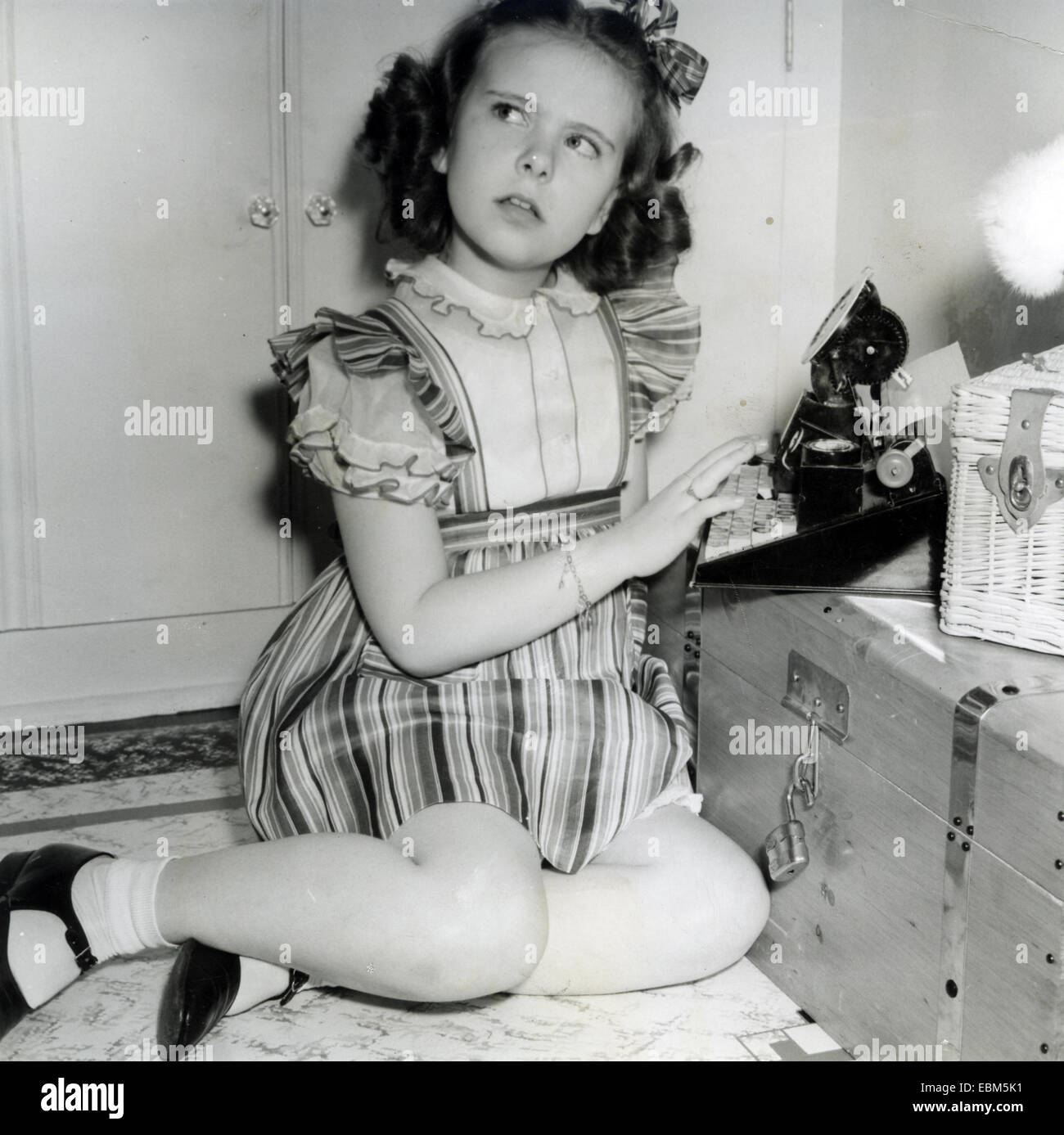 GIRL WITH TOY TYPEWRITER Stock Photo - Alamy