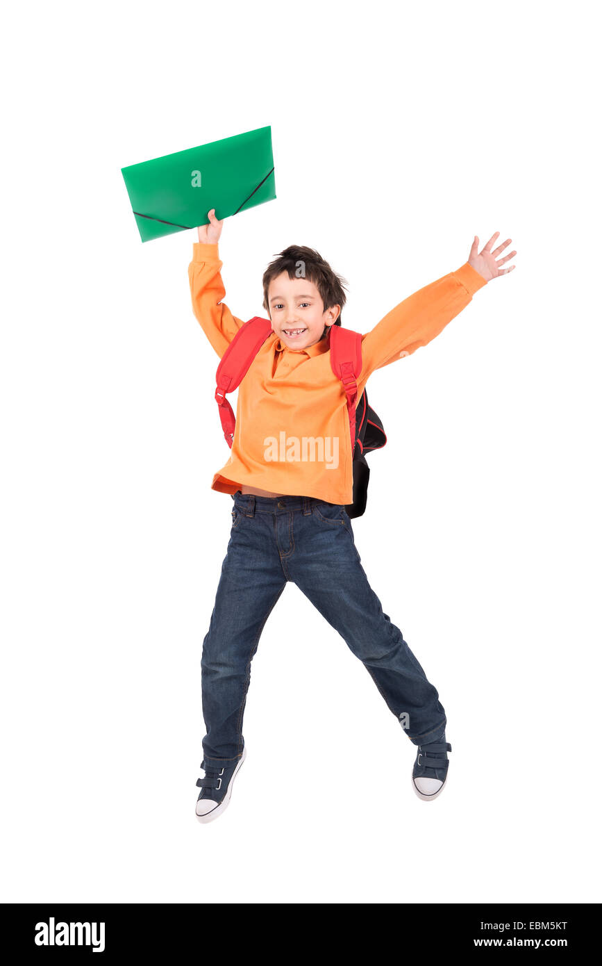 Young boy student jumping isolated in white Stock Photo - Alamy