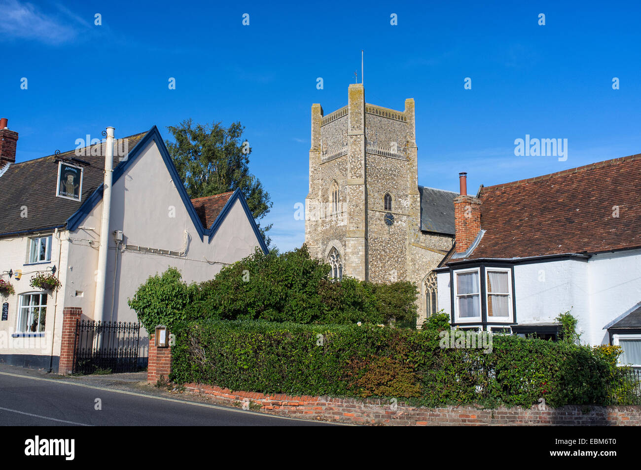 Cottages and St. Bartholomews's Church in Orford Suffolk England Stock ...