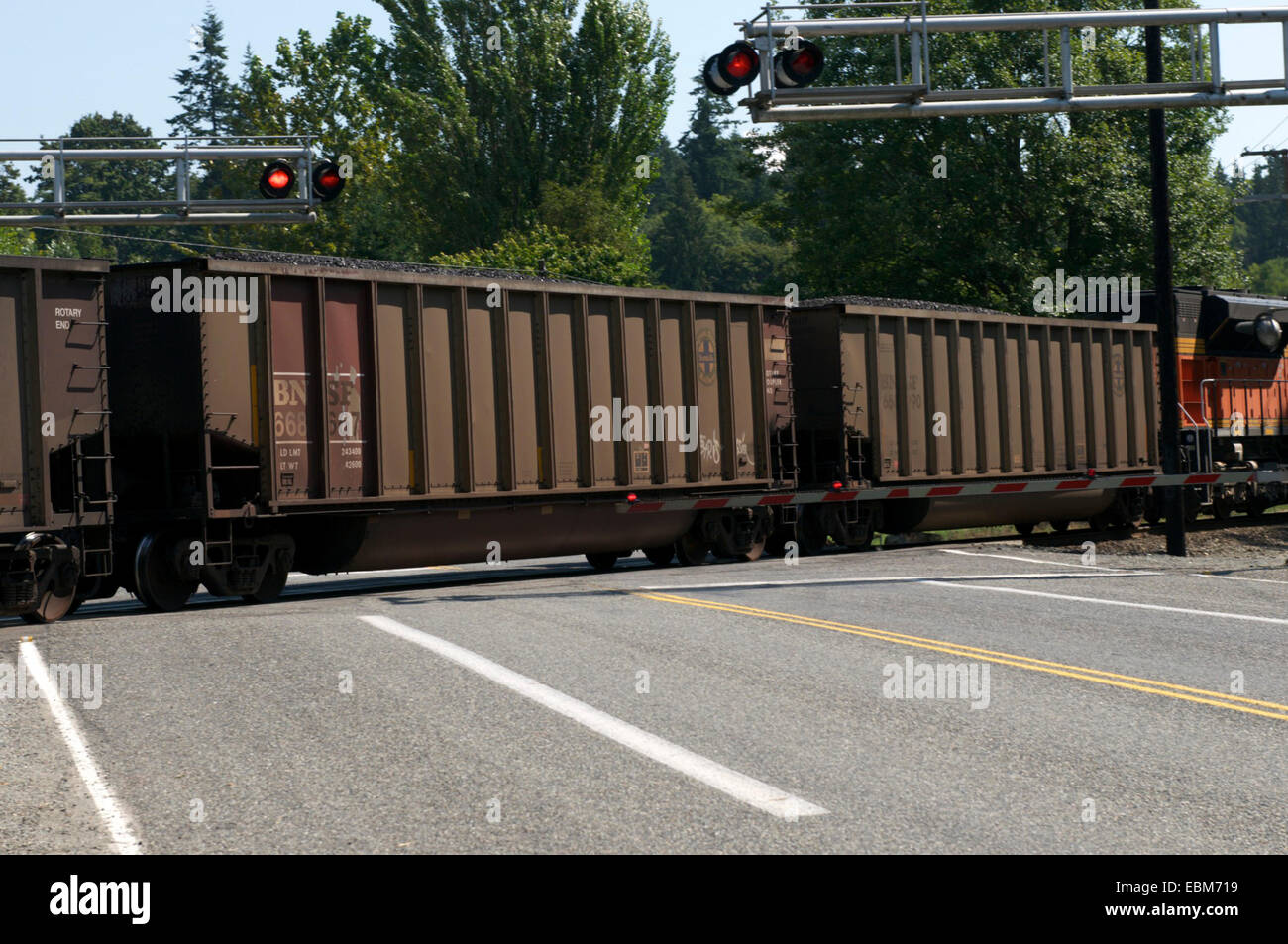 Open top coal train creates pollution concerns Stock Photo - Alamy