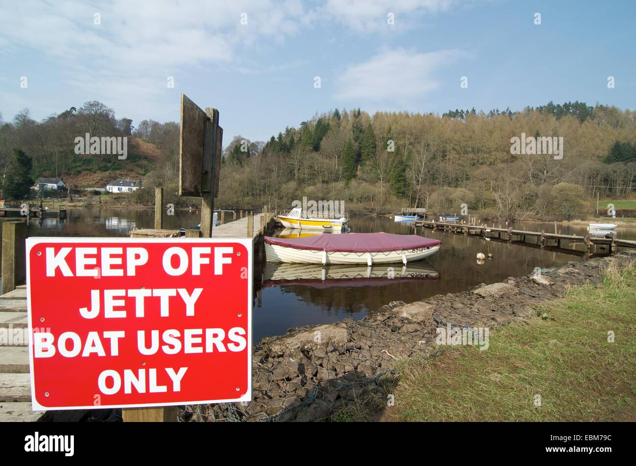 Warning sign at boat jetty on Loch Lomond, Scotland, UK Stock Photo - Alamy
