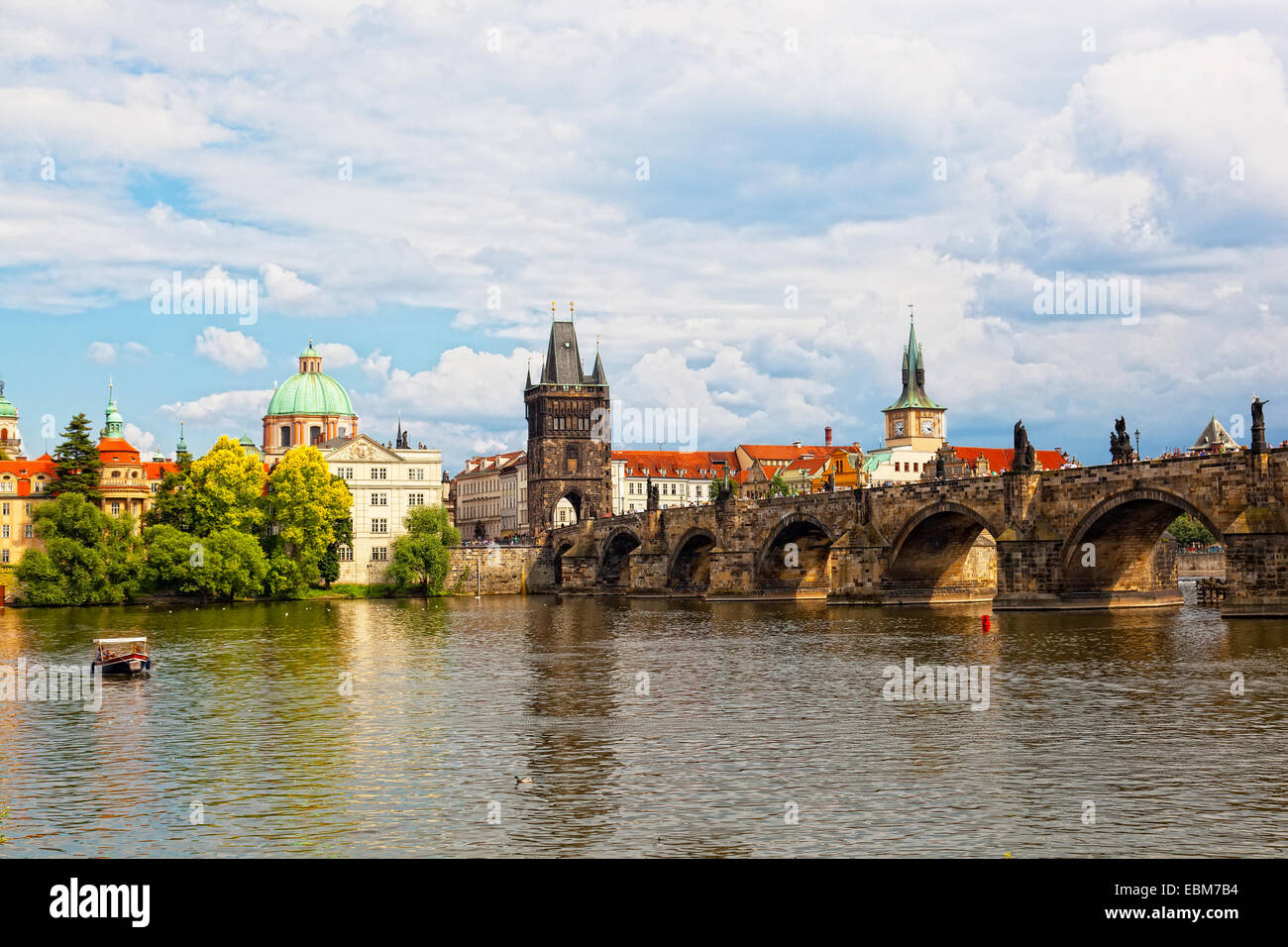 Prague, view of Karlov Bridge and tourists going on it Stock Photo - Alamy
