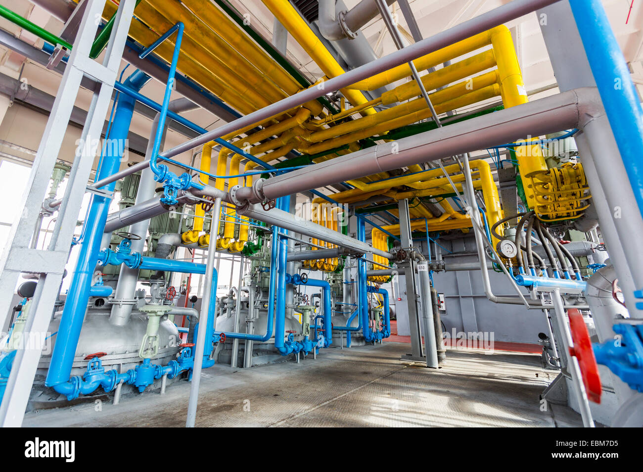 Pipelines of an oil refinery from the inside Stock Photo - Alamy