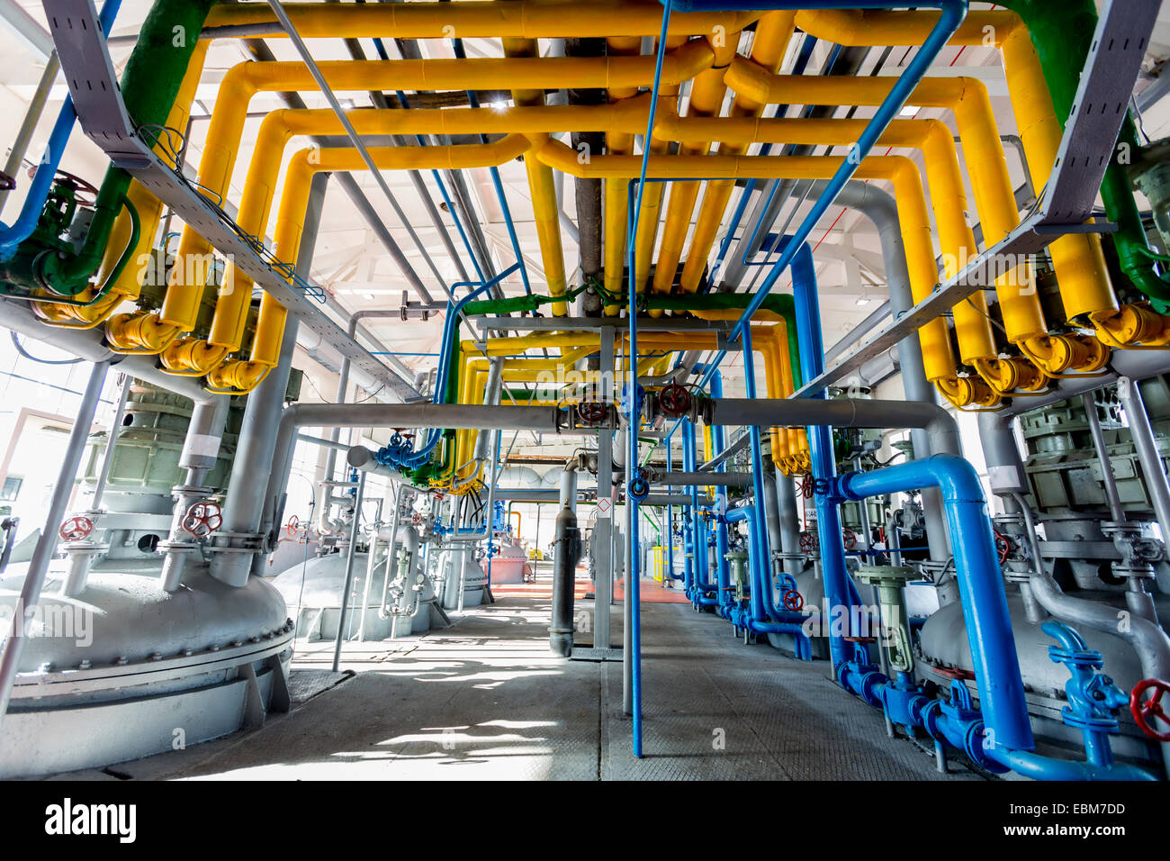 Pipelines of an oil refinery from the inside Stock Photo - Alamy