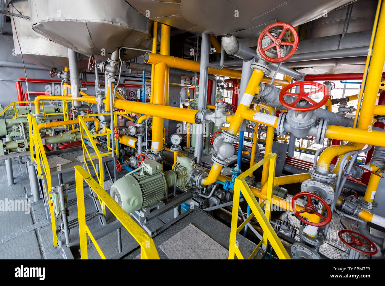 Pipelines of an oil refinery from the inside Stock Photo - Alamy