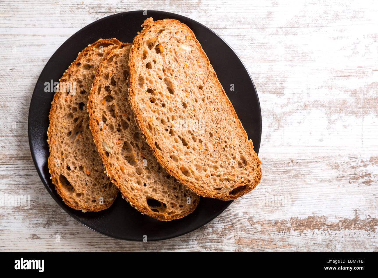Slices of dark bread in the kitchen Stock Photo - Alamy