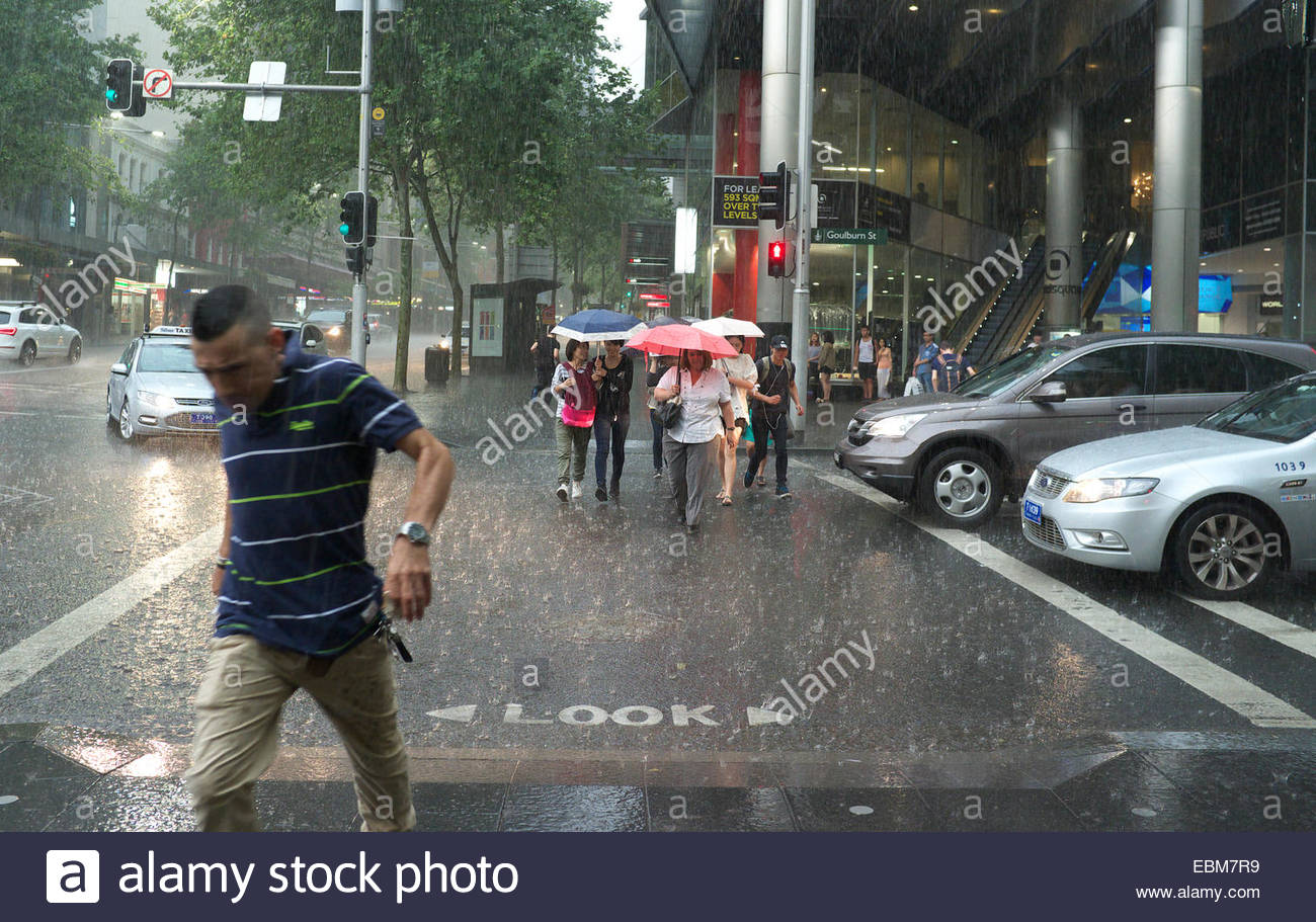 Pouring Rain Person High Resolution Stock Photography and Images - Alamy