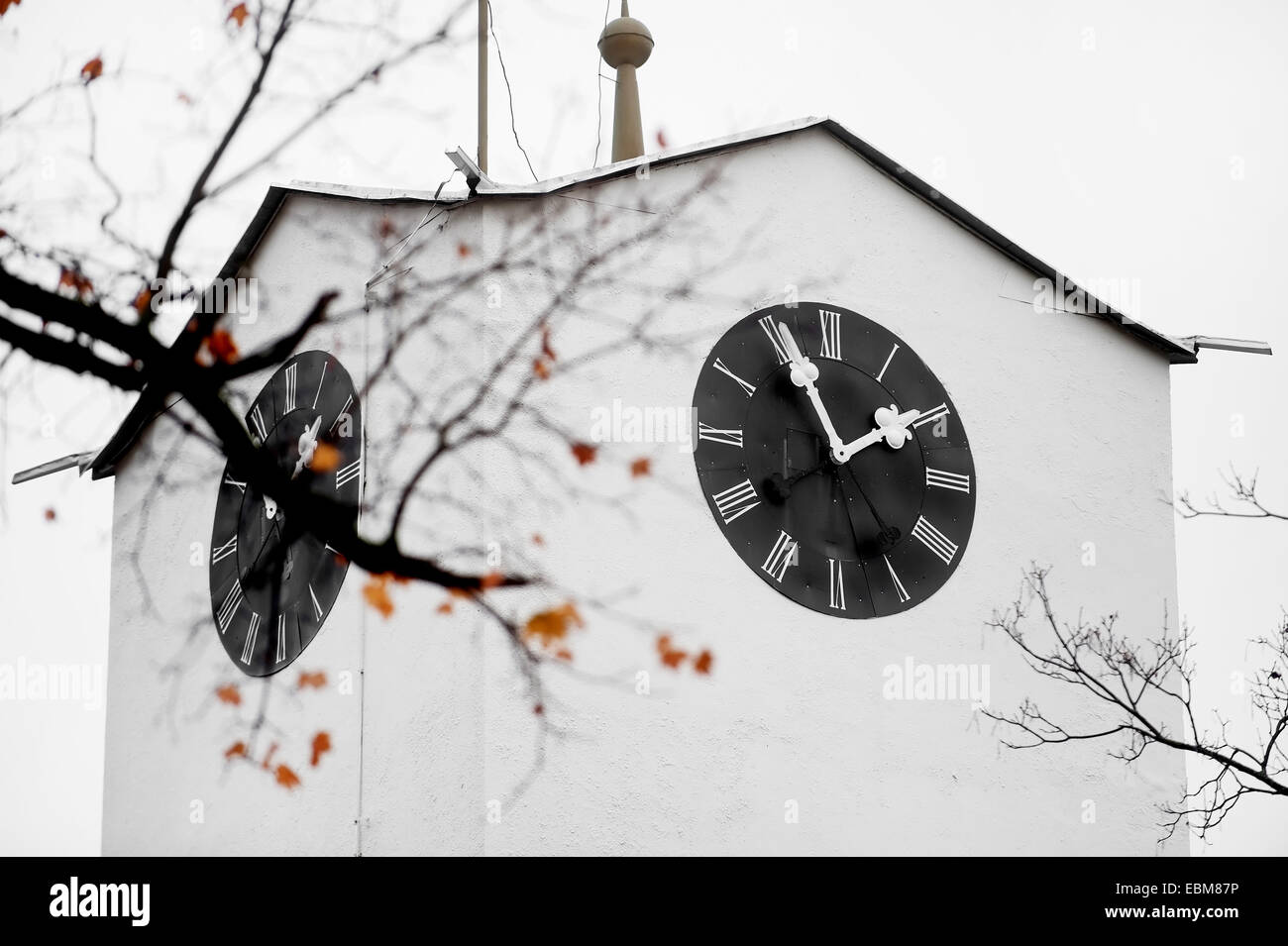 Architecture detail with a church clock tower Stock Photo - Alamy