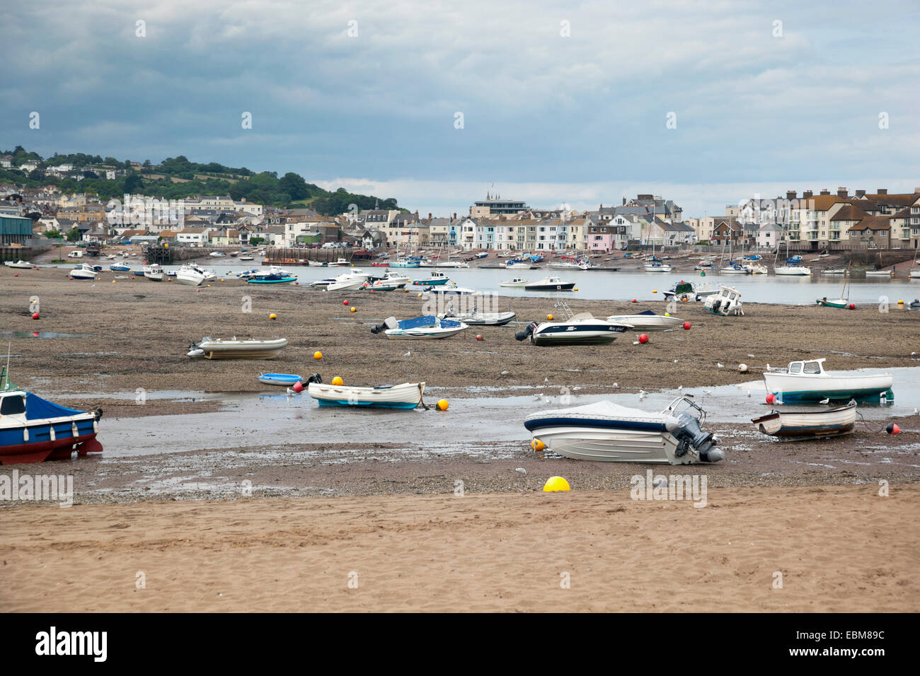 Boats stranded on the shore during a low tide Stock Photo - Alamy