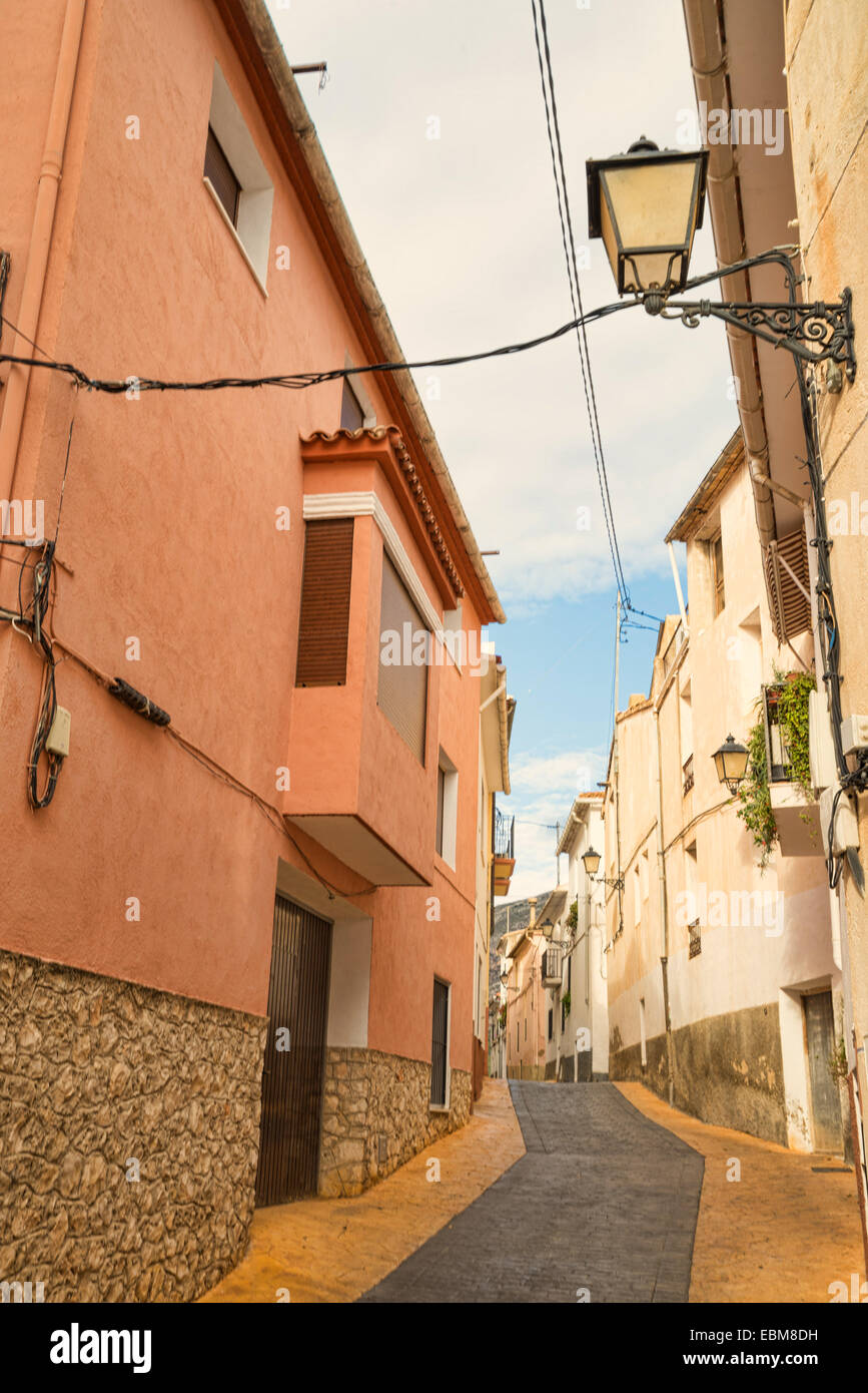 Narrow uphill street in one of the many charming mountain villages on ...