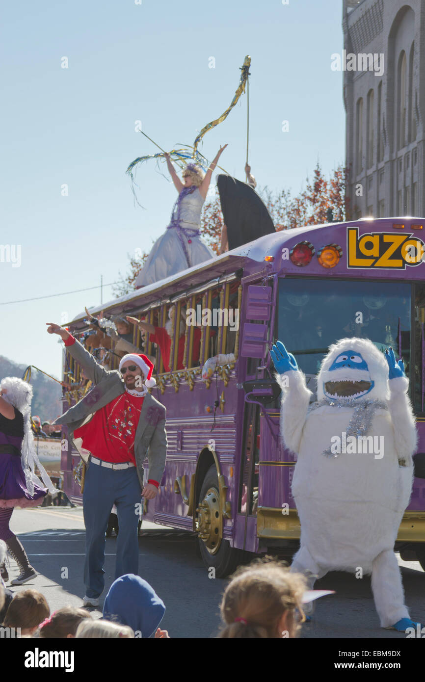 People in costumes cavorting with La Zoom comedy bus during the ...