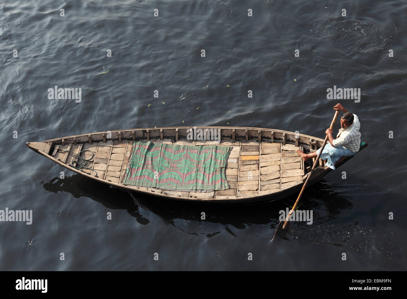 A wooden ferry on the Buriganga River in Dhaka, Bangladesh. The wooden ...