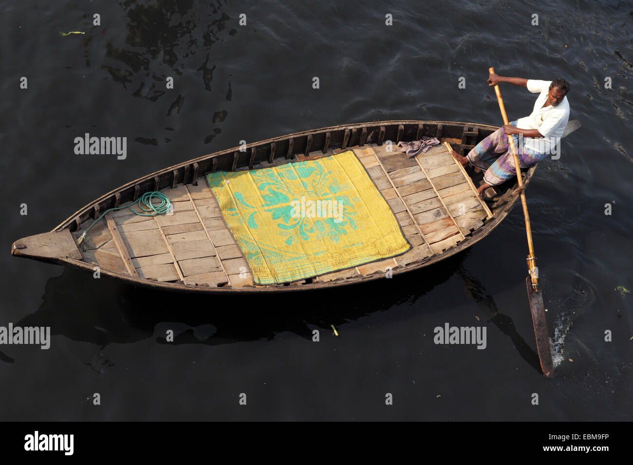 A wooden ferry on the Buriganga River in Dhaka, Bangladesh. The wooden ...