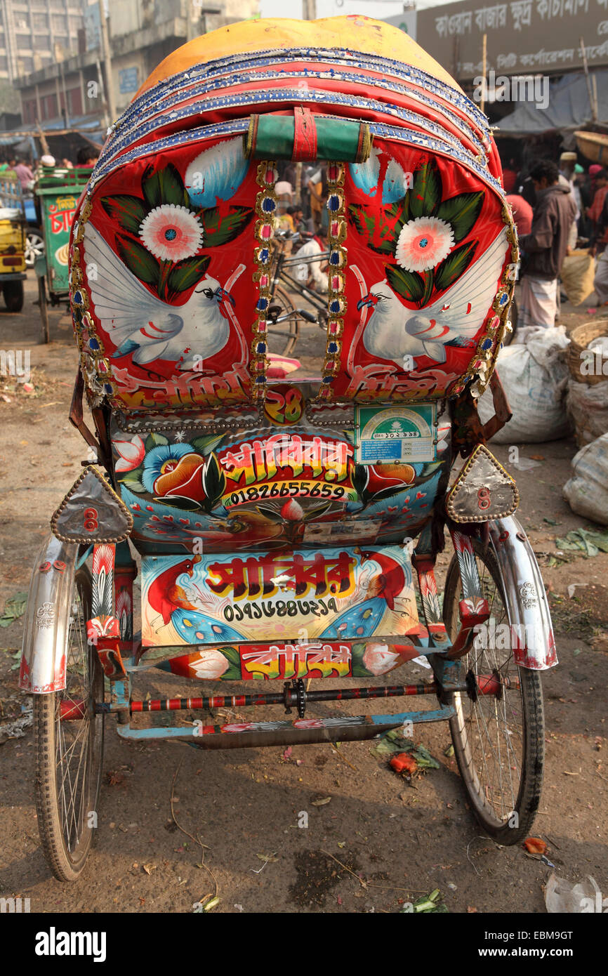 A colourfully painted rickshaw in Dhaka, Bangladesh. The city has ...