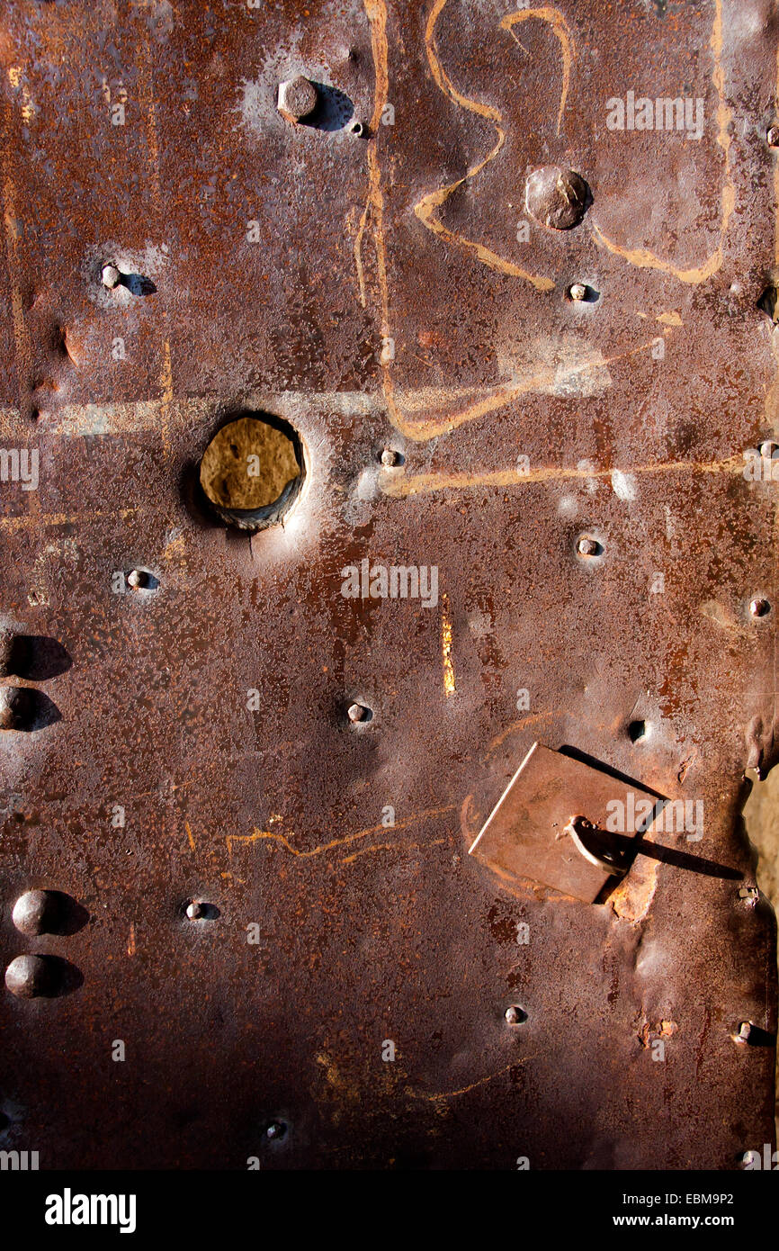 Old rusty iron doors detail Stock Photo - Alamy