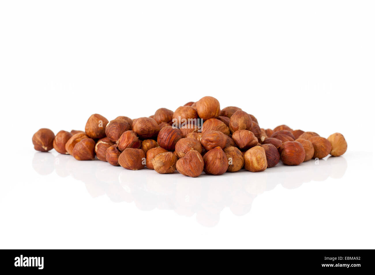 Dried hazelnuts on white background Stock Photo - Alamy