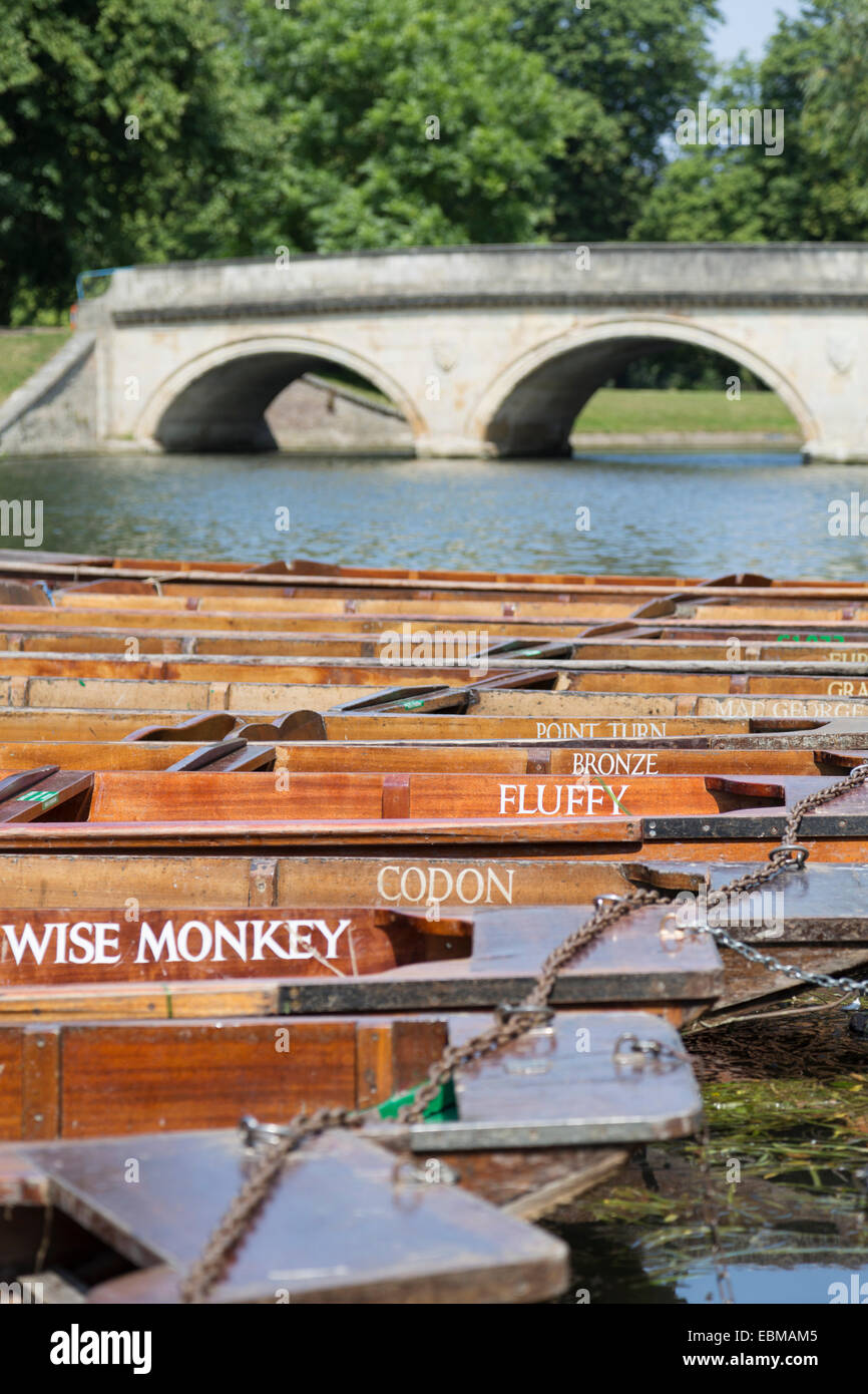 UK, Cambridge, uniquely named punts moored at Trinity College and the ...