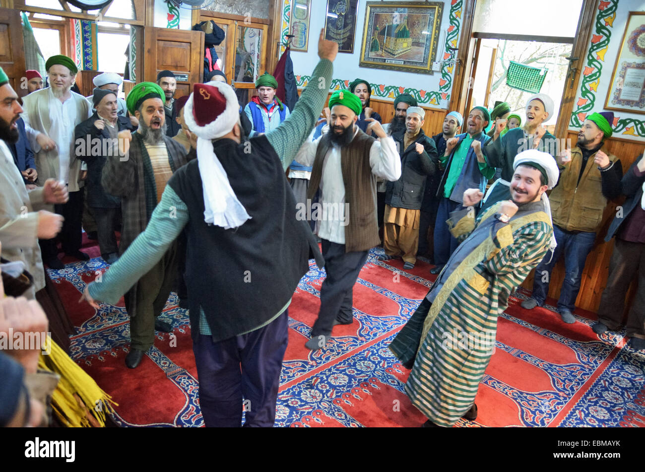 Muslims dancing during zhikr, mystical Sufi prayer, in the mosque ...