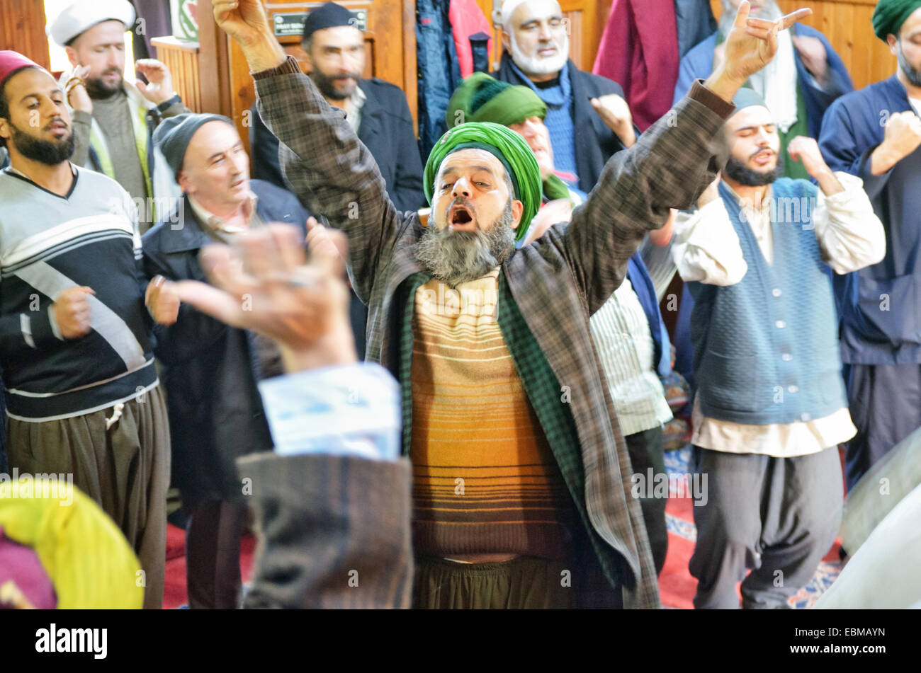 Muslims dancing during zhikr, mystical Sufi prayer, in the mosque ...