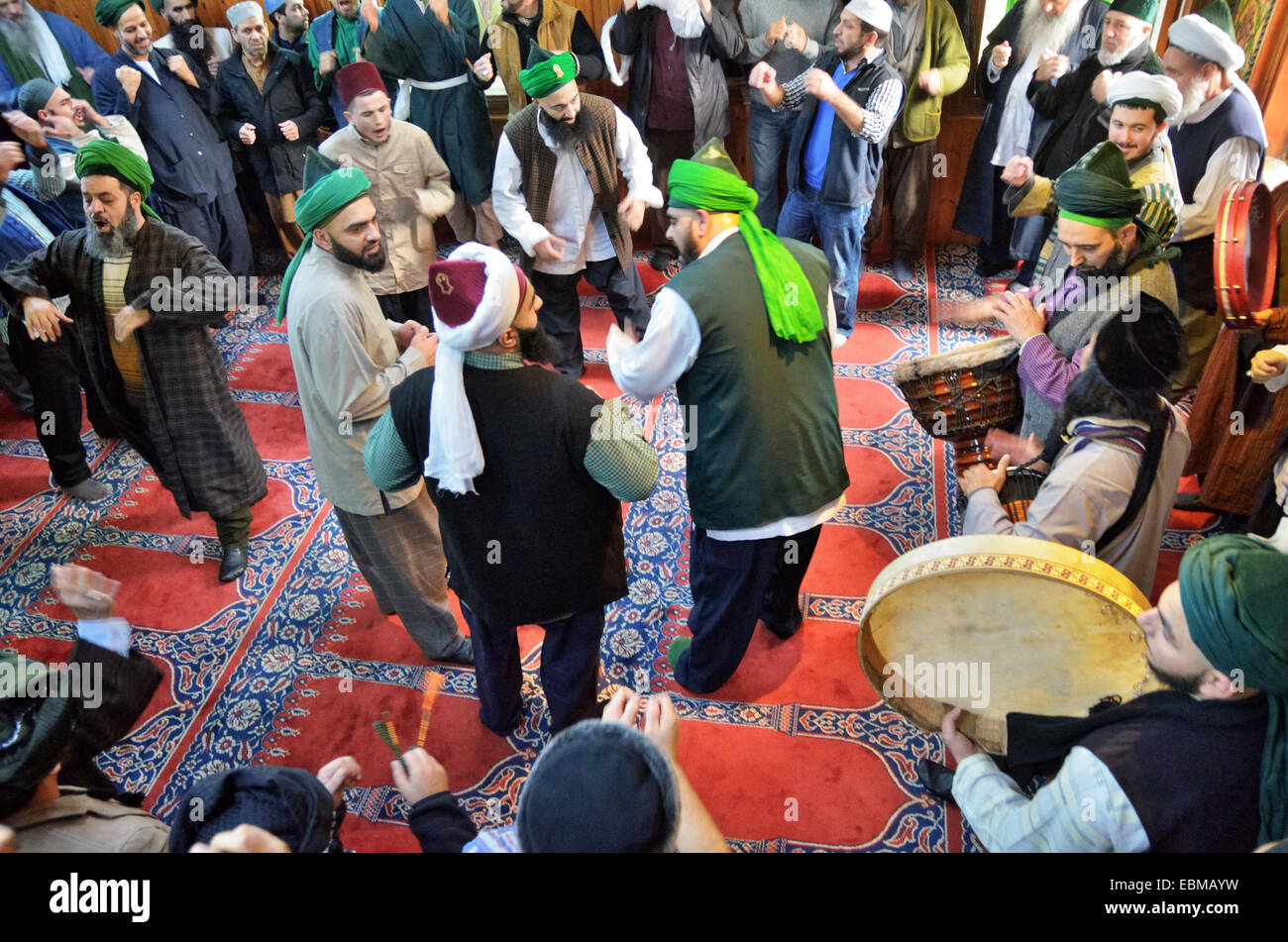 Muslims dancing during zhikr, mystical Sufi prayer, in the mosque ...