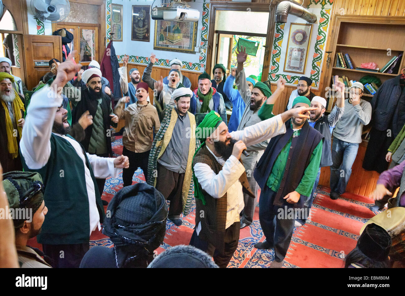 Muslims dancing during zhikr, mystical Sufi prayer, in the mosque ...