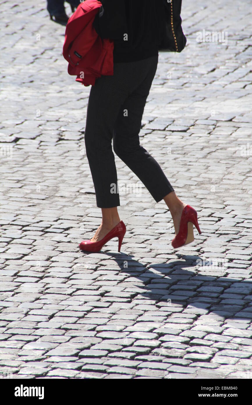 woman wearing red high heels shoes in street in rome italy Stock Photo ...