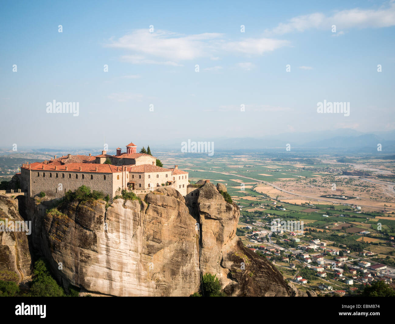 Moni Agiou Stefanou monastery atop the rocks above the valley Stock ...