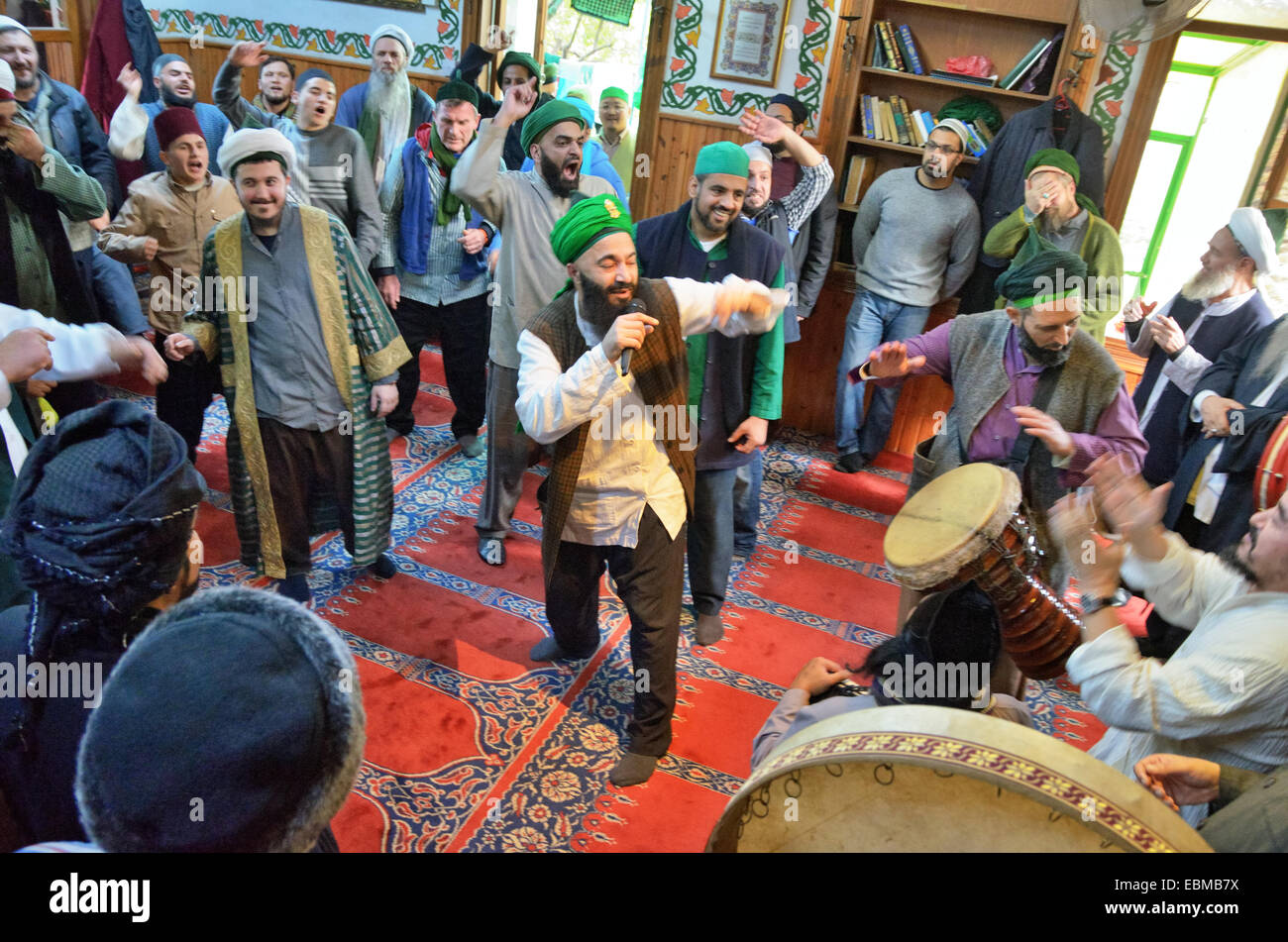 Muslims dancing during zhikr, mystical Sufi prayer, in the mosque ...