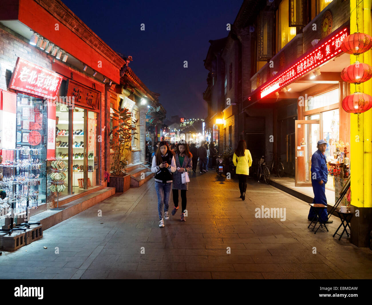 Girl walking on street beijing hi-res stock photography and images - Alamy