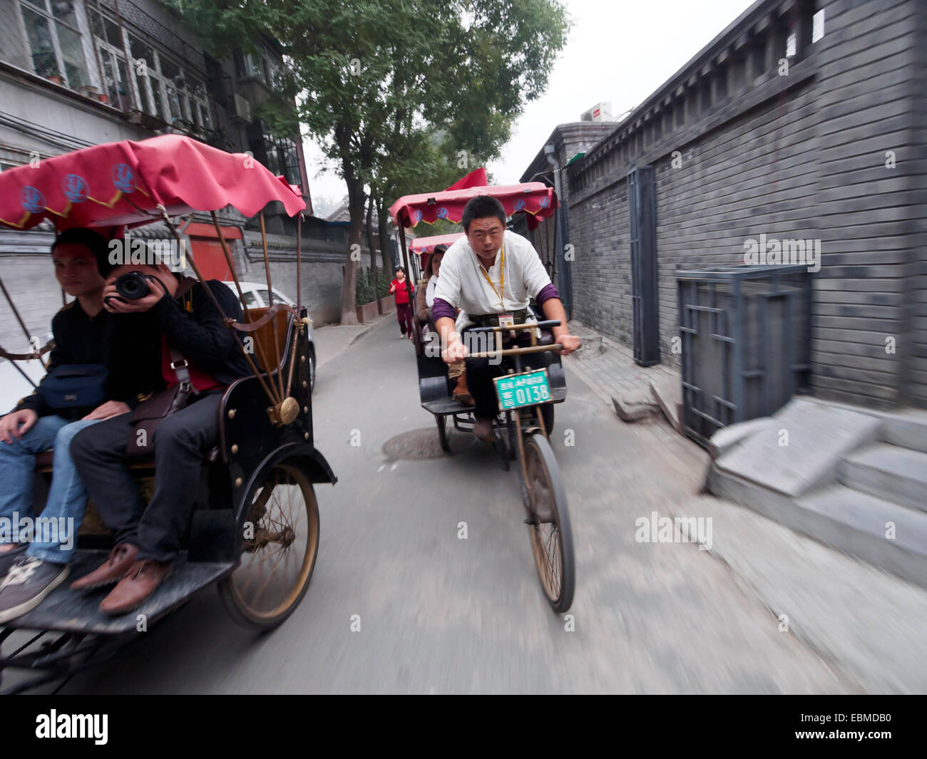 Rickshaw ride through the streets of Beijing, China Stock Photo - Alamy