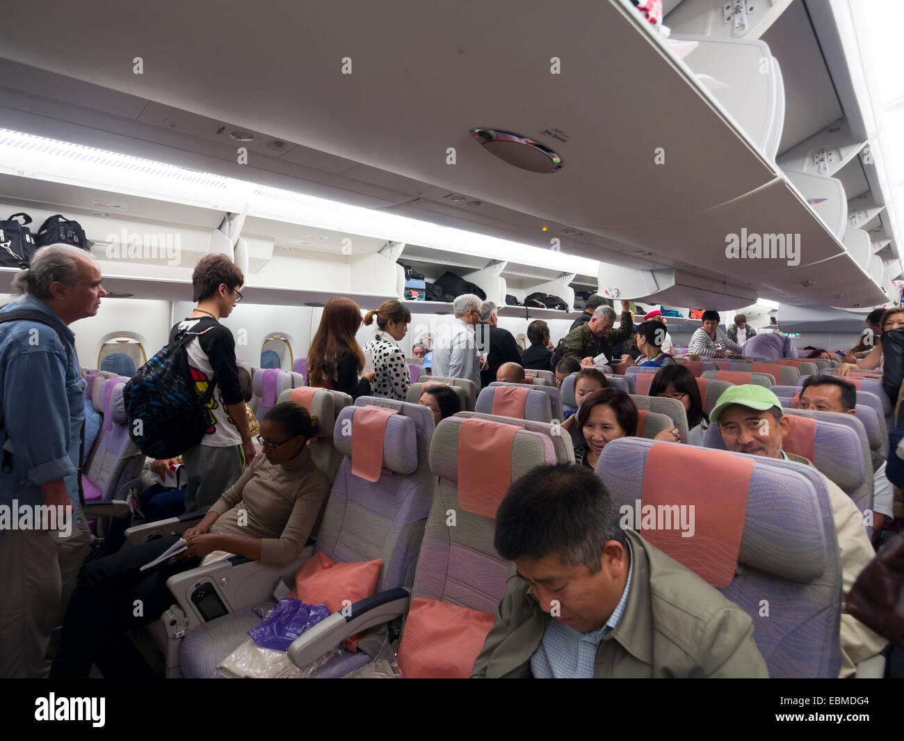 Crowded Airbus A380 airplane cabin interior Stock Photo - Alamy