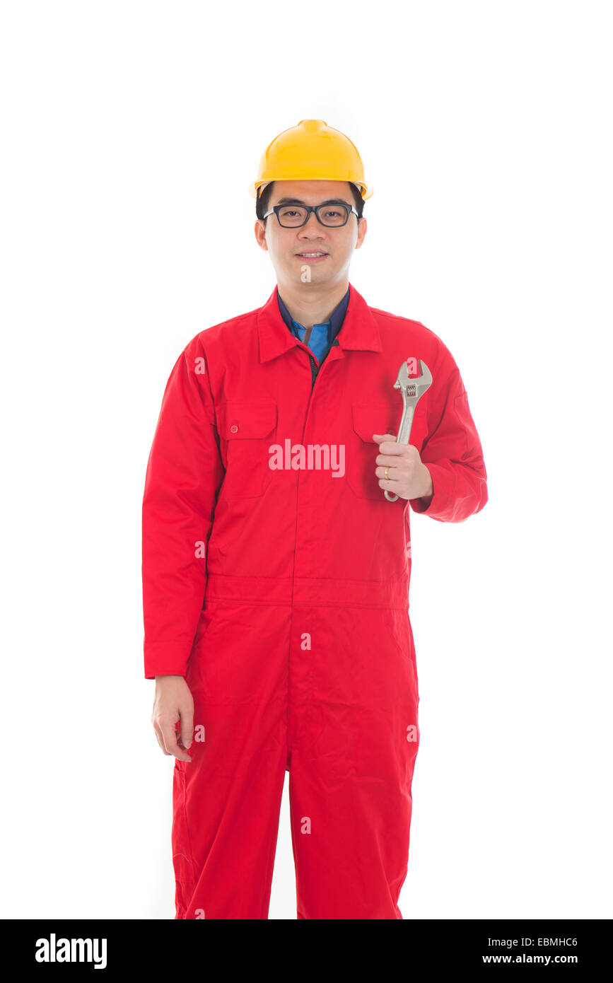 asian male engineer holding a wrench Stock Photo - Alamy