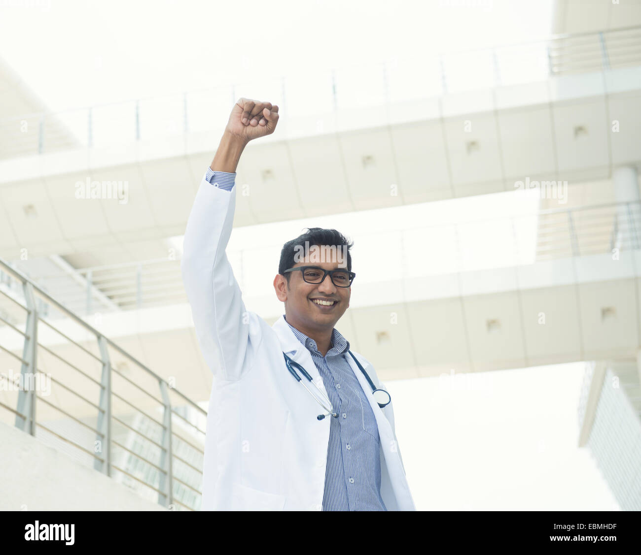 indian male doctor celebrating success , slight vintage tone Stock ...