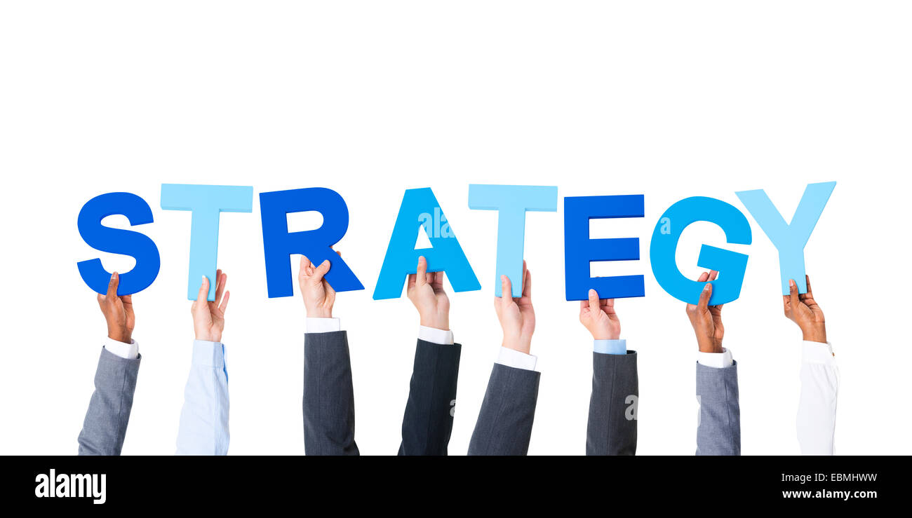 Business People Arms Raised and Holding the Word Strategy Stock Photo ...