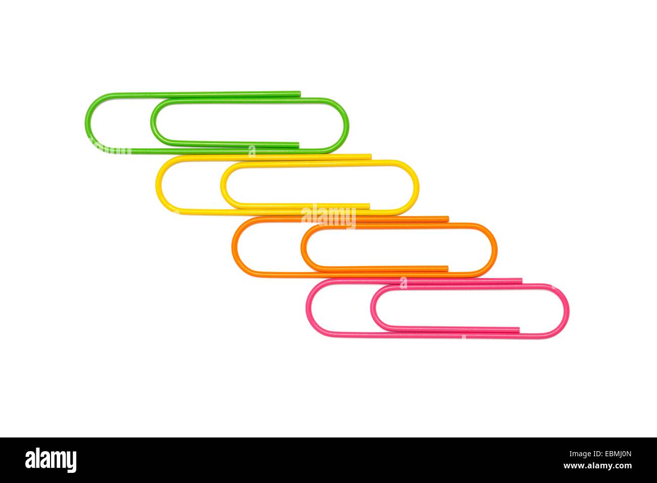 Giant paper clips arranged on a white paper background Stock Photo - Alamy