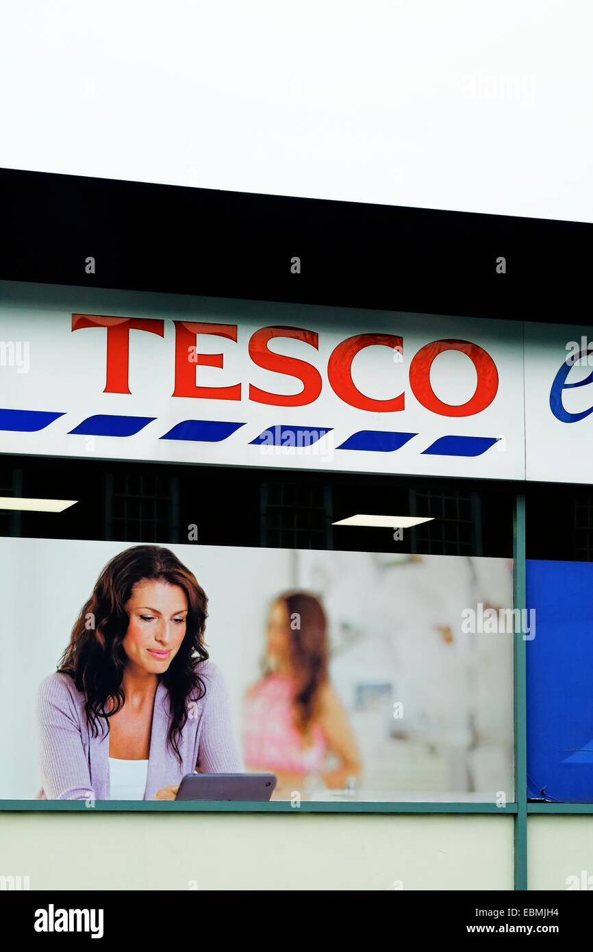 Tesco Express promotional window advertising England uk Stock Photo - Alamy