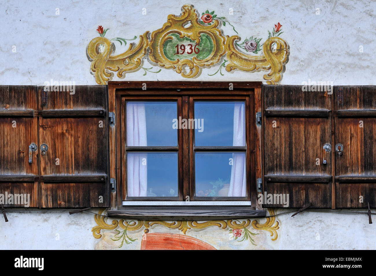 Window with shutters and Lueftlmalerei murals from 1936 on a farmhouse ...