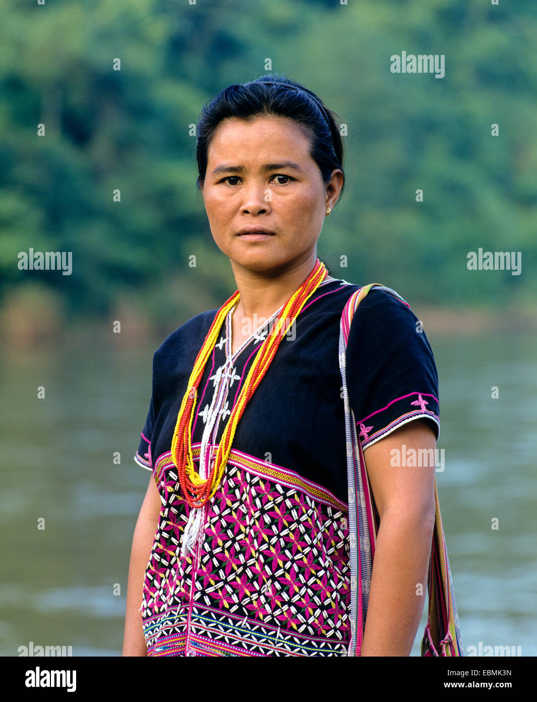 Karen woman with traditional clothing, next to the River Kok, Chiang ...
