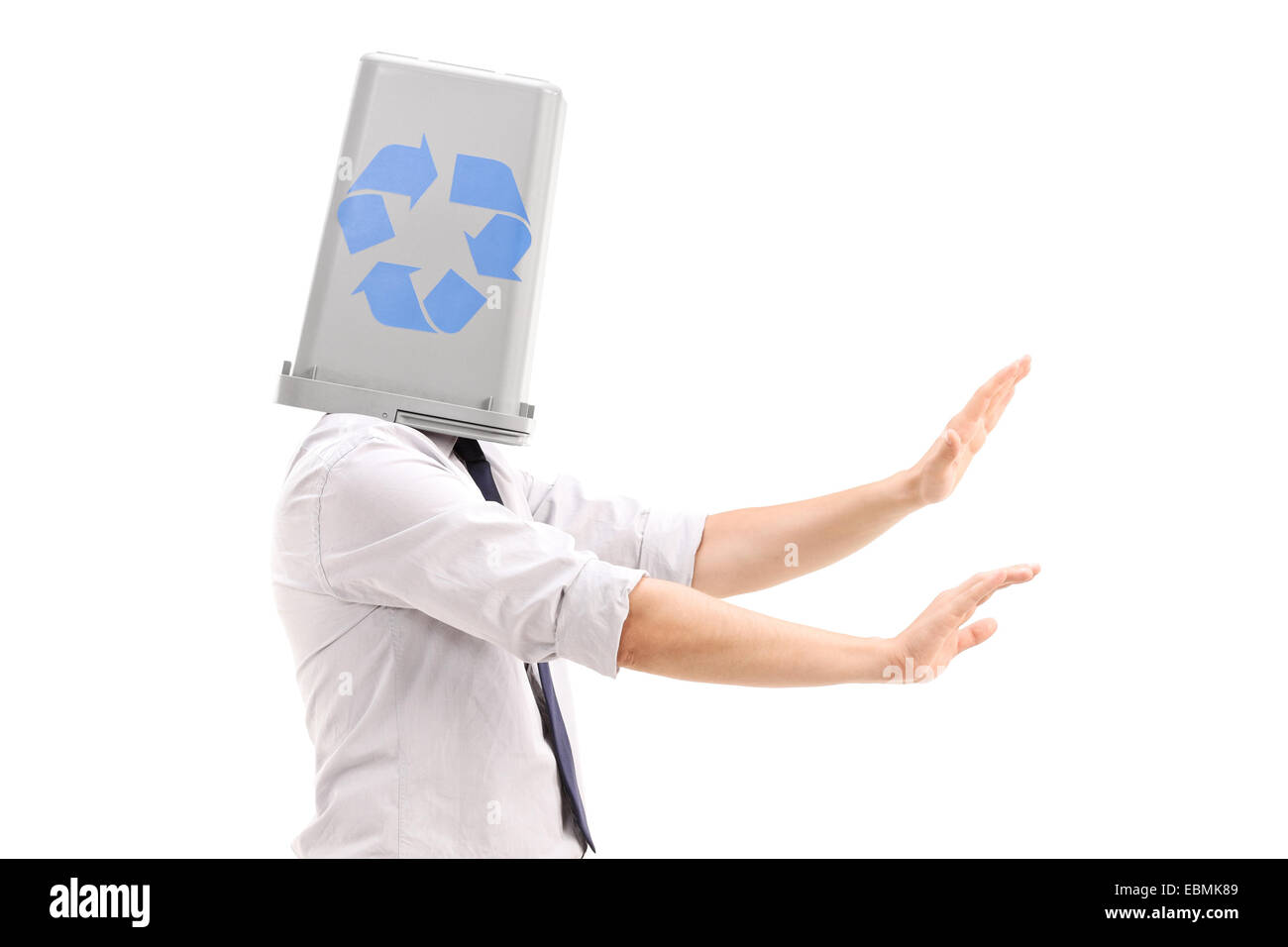 Lost man with a recycle bin over his head isolated against white ...