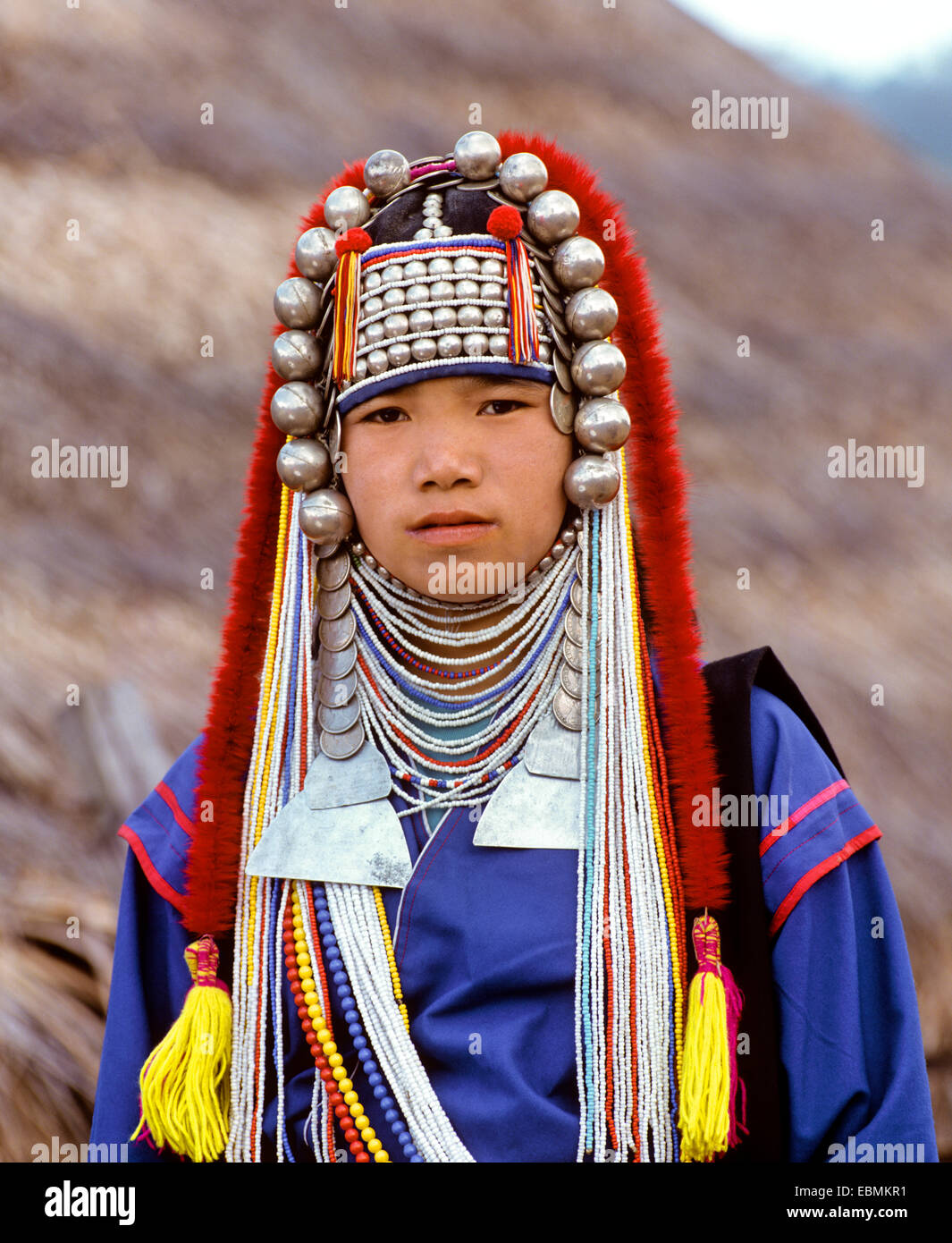 Akha girl with traditional clothing and headdress, portrait, Chiang Rai ...