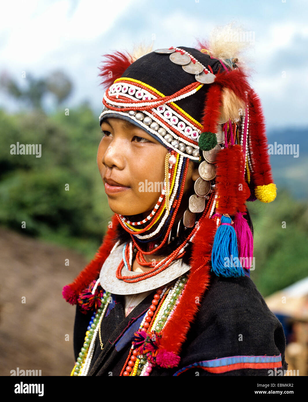Akha girl with traditional clothing and headdress, portrait, Chiang Rai ...