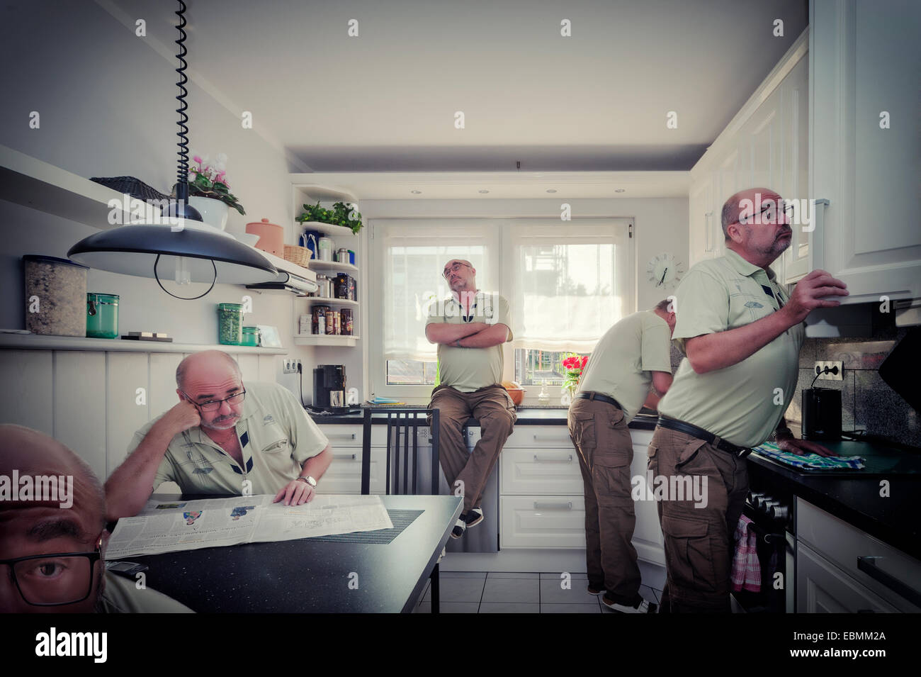 Man in a kitchen, multiple exposure, Germany Stock Photo - Alamy