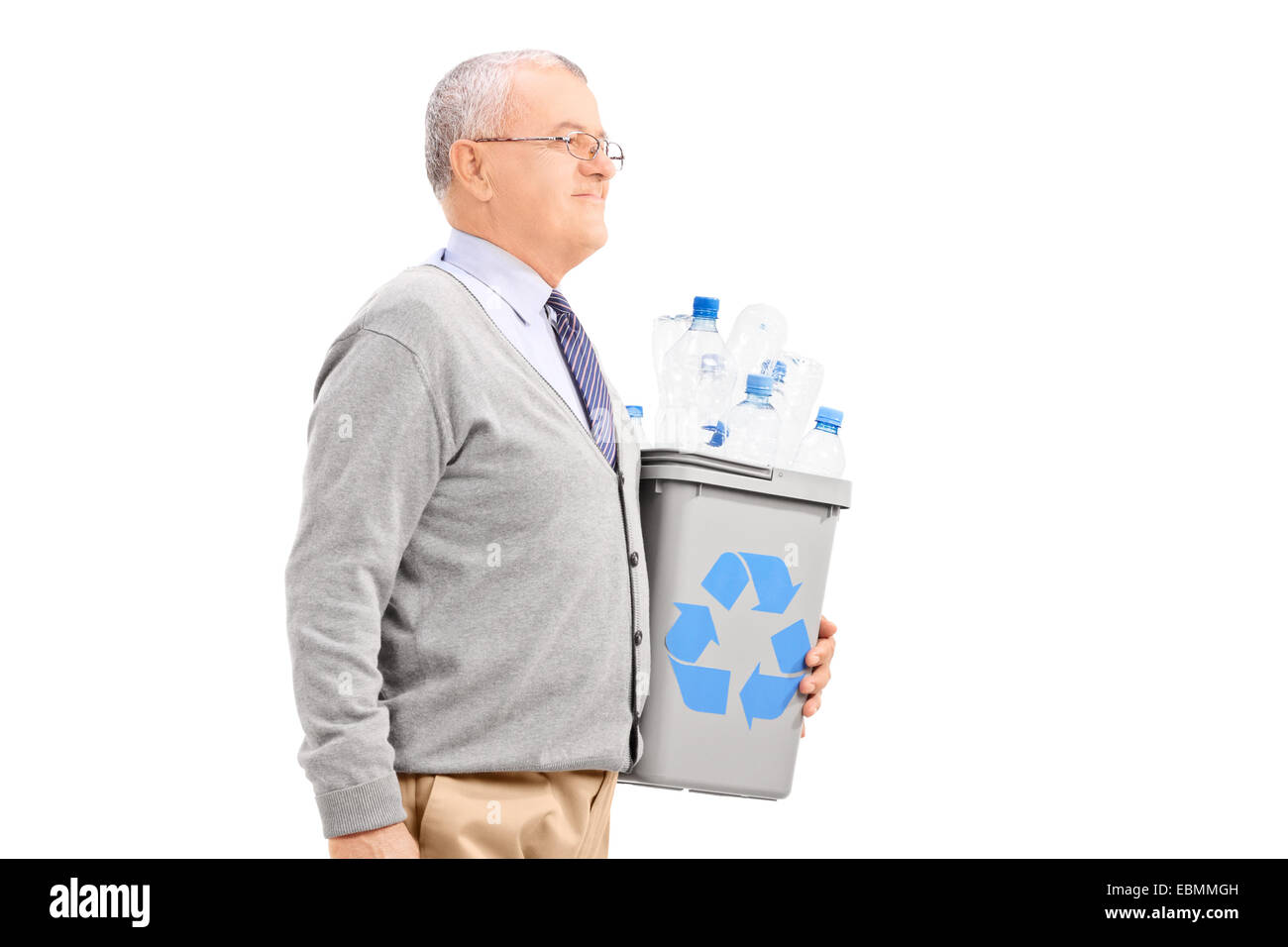 Senior man holding a recycle bin isolated on white background Stock ...