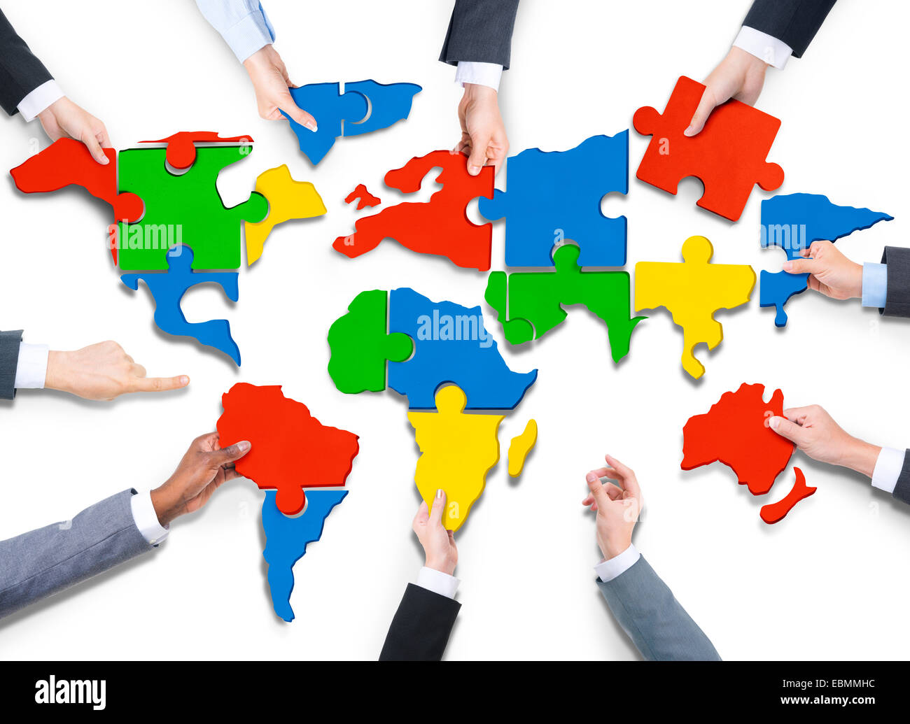 Group of Business People with Jigsaw Puzzle Forming in World Map Stock ...