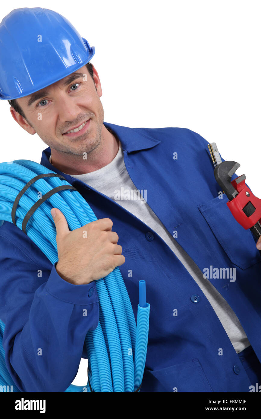 plumber with helmet Stock Photo - Alamy