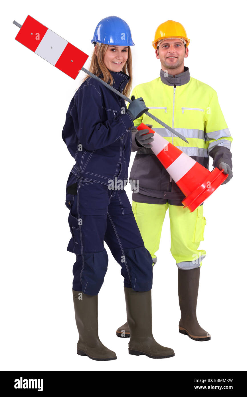 Worker with road diversion sign hi-res stock photography and images - Alamy